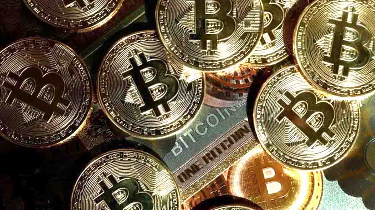 Bitcoin atinge novo recorde e chega a 123 mil dólares